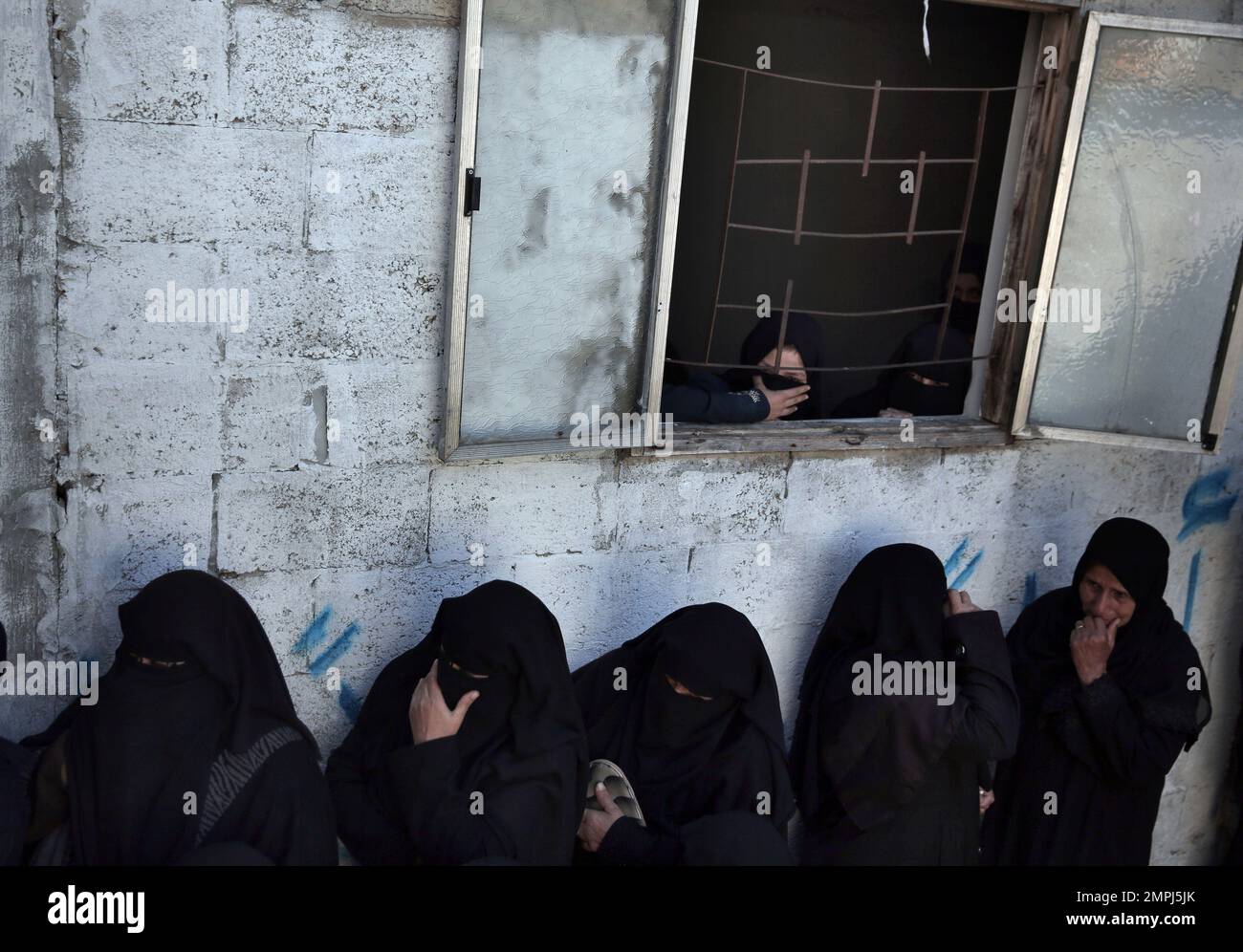 Relatives of 30-year-old Mohammed Al-Masri, who was killed during ...