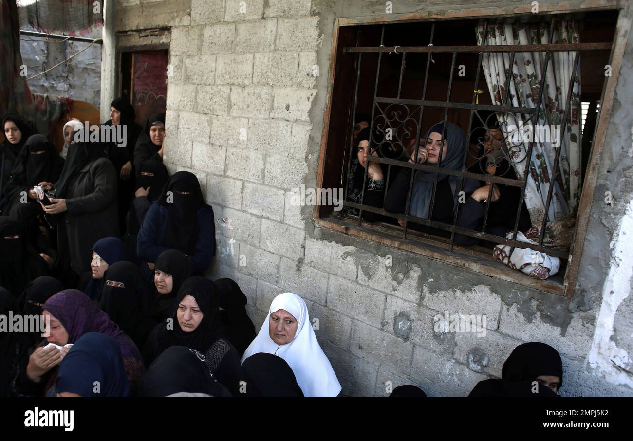 Relatives of 30-year-old Mohammed Al-Masri, who was killed during ...