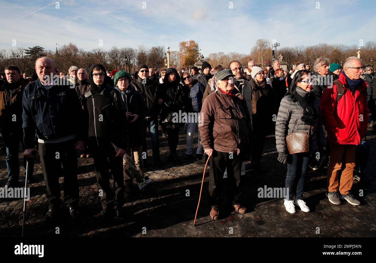 A crowd watch French rock star Johnny Hallyday's funeral ceremony in ...