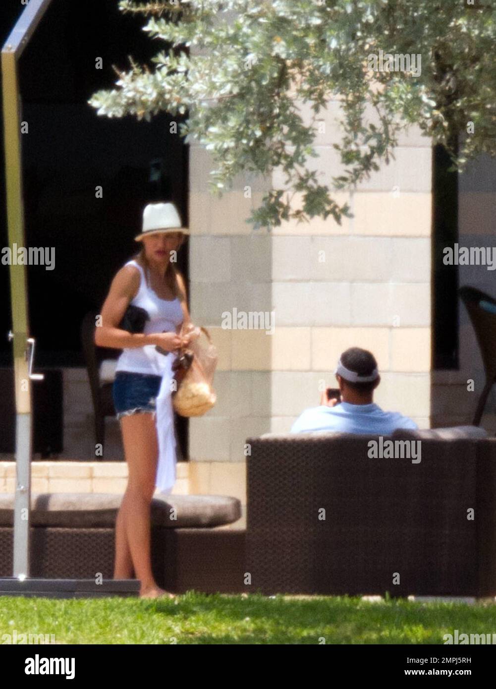 Cameron Diaz and beau Alex Rodriguez relax on shore after taking to the waters of Biscayne Bay ...