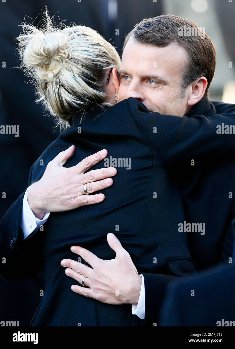 French President Emmanuel Macron hugs French rock star Johnny Hallyday ...