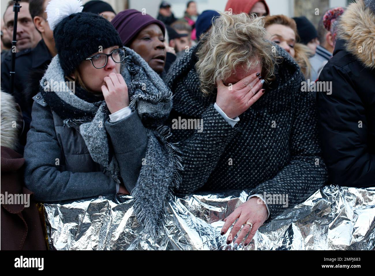 People wait outside the Madeleine church to attend Johnny Hallyday's ...