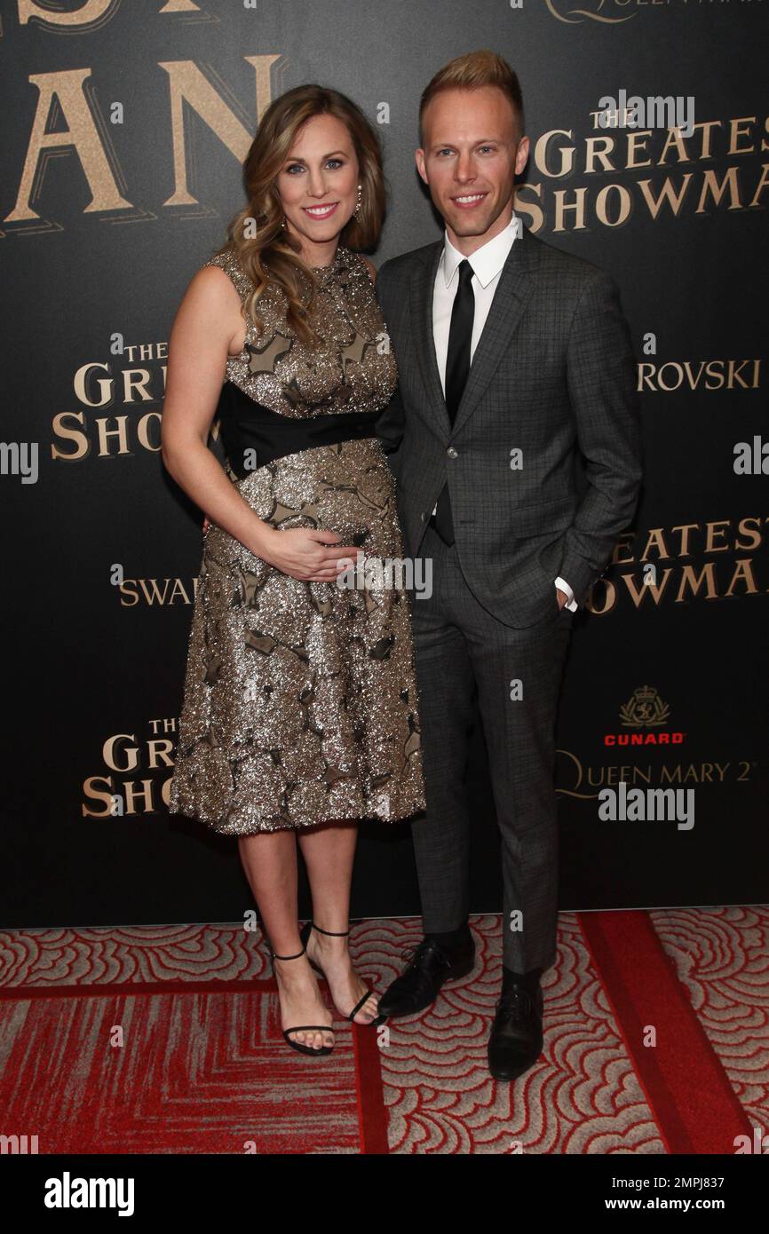 Asher Fogle Paul, left, and Justin Paul, right, attend the world ...