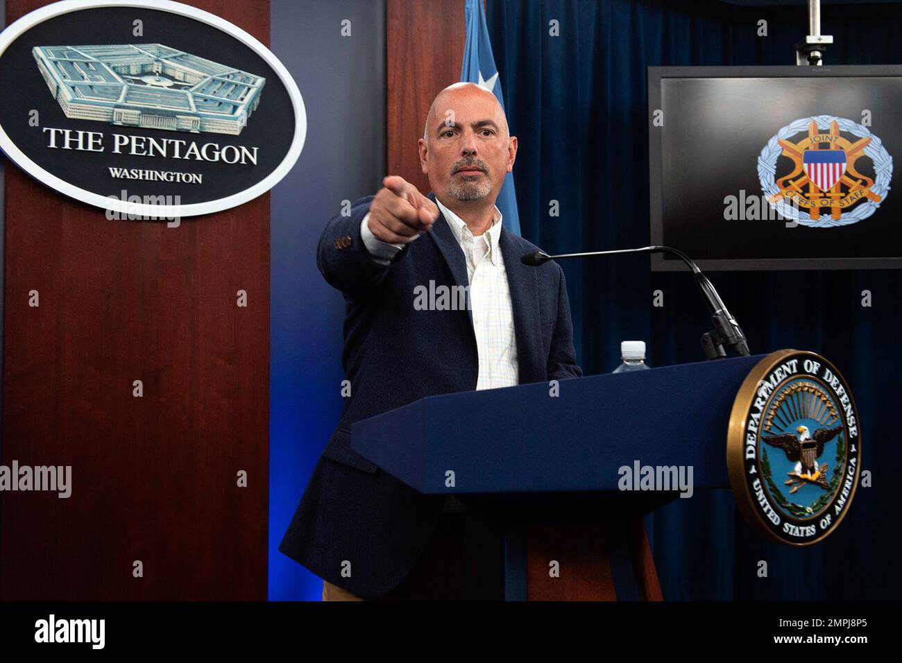 Brian Kennedy poses in the Pentagon press briefing room during the 93rd ...