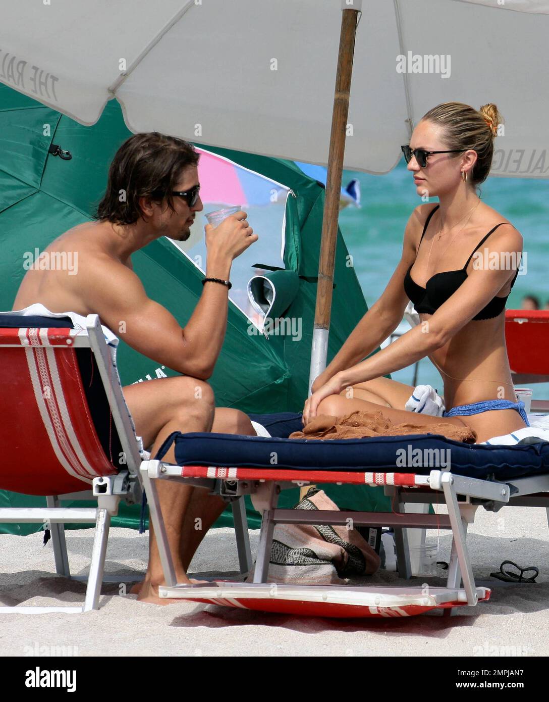 Victoria's Secret supermodel Candice Swanepoel spends the Fourth of July holiday on the beach ...