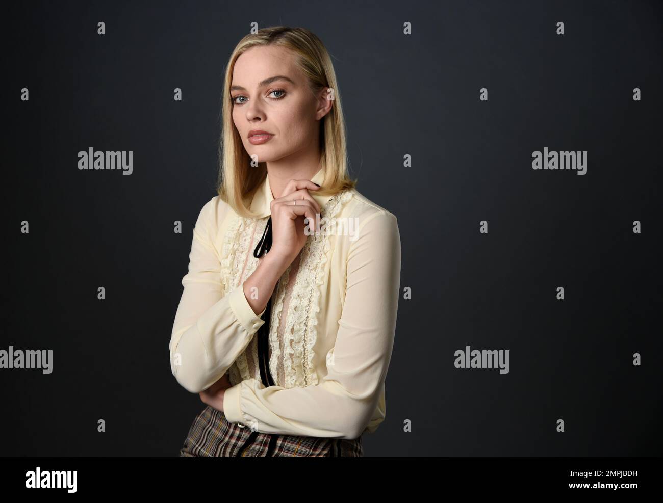 Margot Robbie, a cast member in the film "I, Tonya," poses for a ...