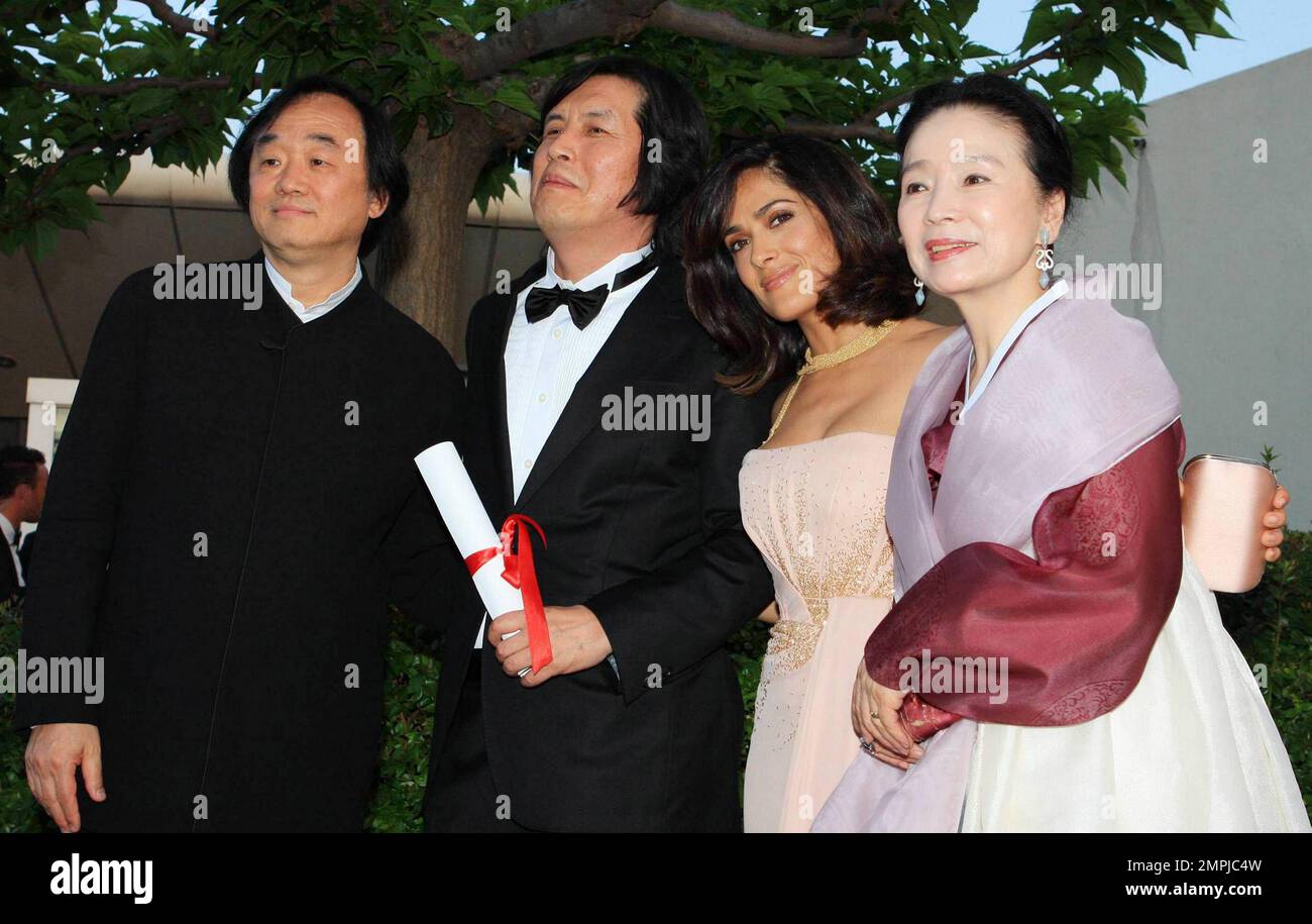 Salma Hayek poses with the cast and crew of the South Korean film "Poetry", writer and director ...