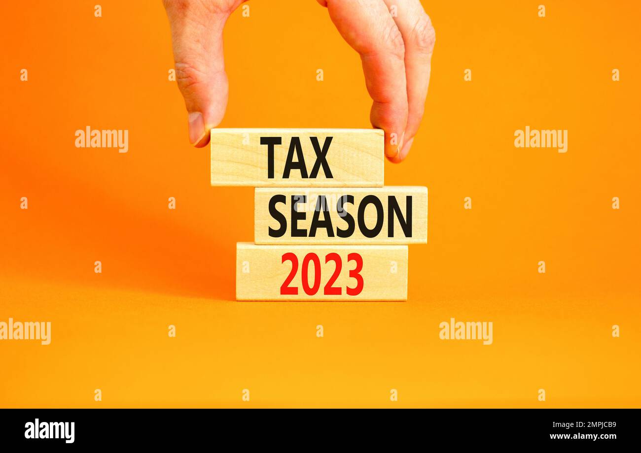 Tax season 2023 symbol. Concept words Tax season 2023 on wooden blocks ...