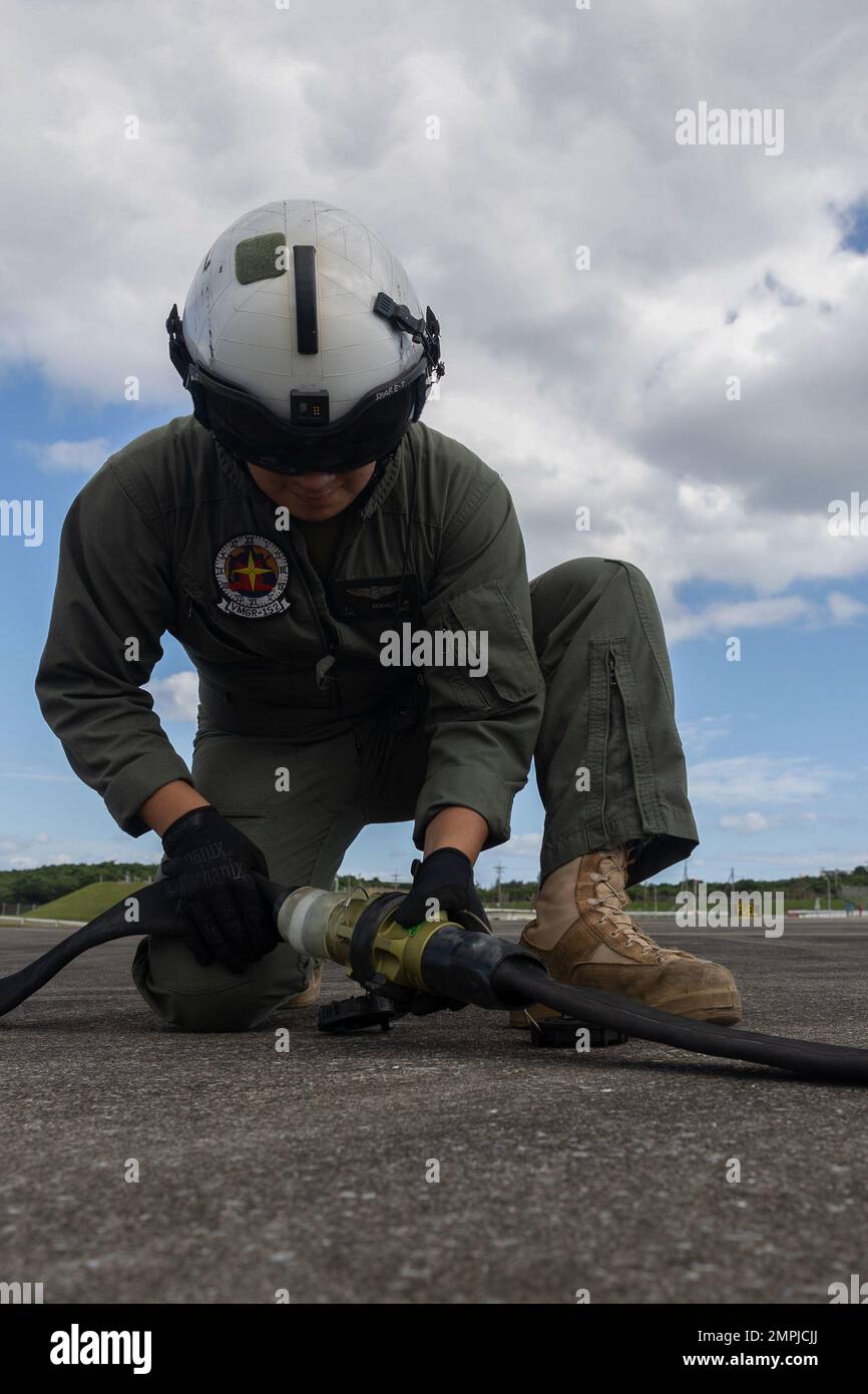 U.S. Marine Corps Cpl. Juan Morales, a load master with Marine Aerial ...