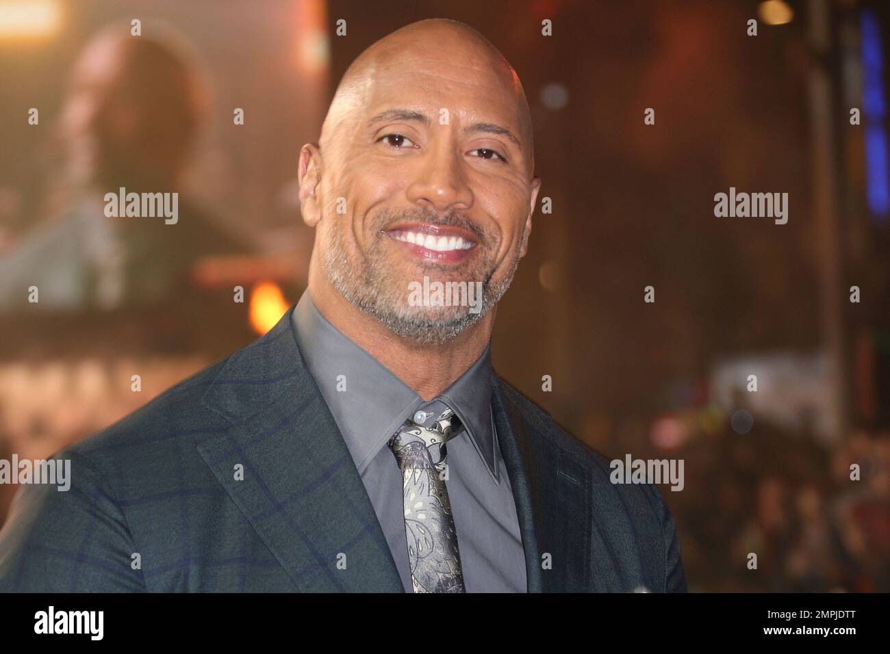 Actor Dwayne Johnson poses for photographers upon arrival at premiere ...