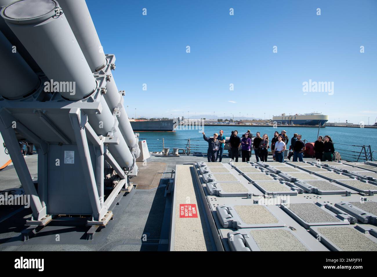 Lt. Daniel Ehrlich, left, explains the workings of defensive weapon ...