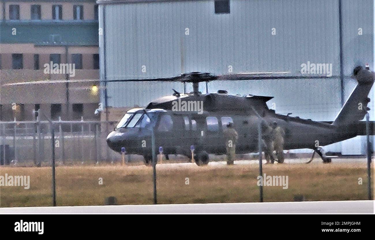An aircrew with the Minnesota National Guard operates a UH-60 Black ...