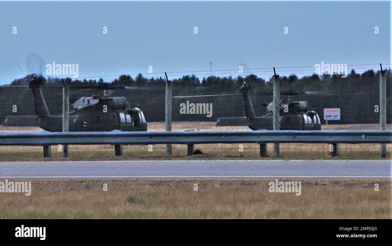 An aircrew with the Minnesota National Guard operates a UH-60 Black ...