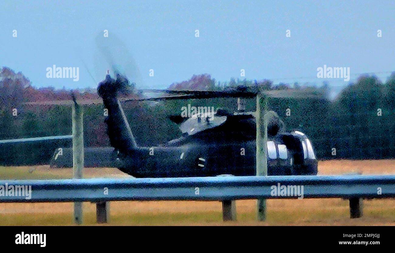 An aircrew with the Minnesota National Guard operates a UH-60 Black ...