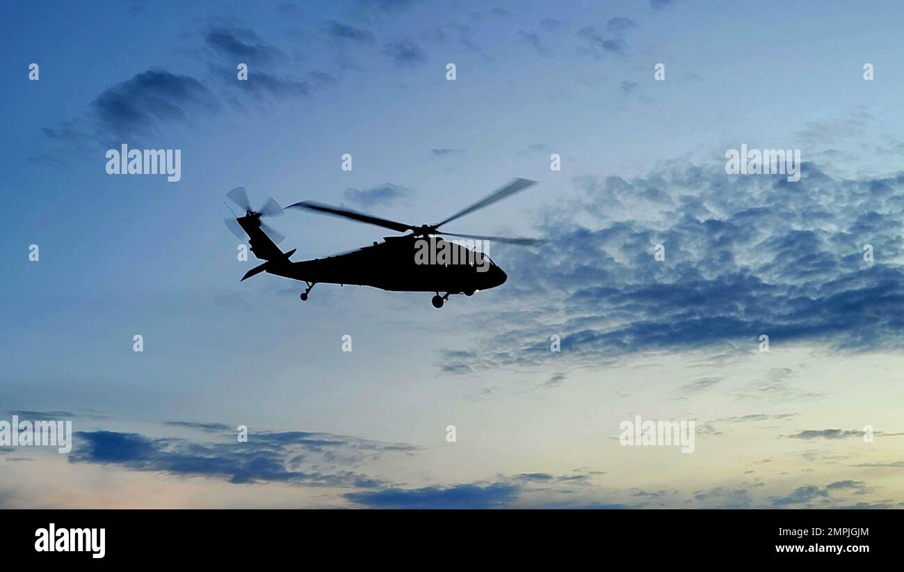 An aircrew with the Minnesota National Guard operates a UH-60 Black ...