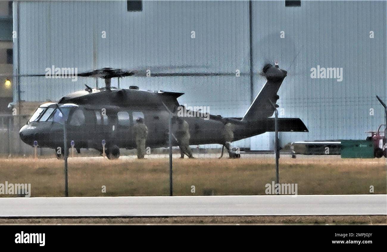 An aircrew with the Minnesota National Guard operates a UH-60 Black ...