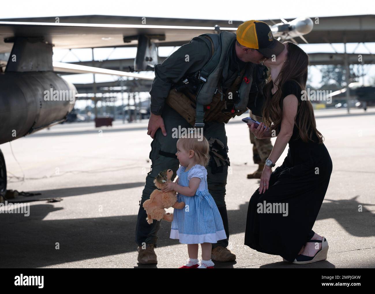U.S. Air Force Capt. Park “Drago” Lundgreen, 79th Fighter Squadron (FS) fighter pilot, embraces ...