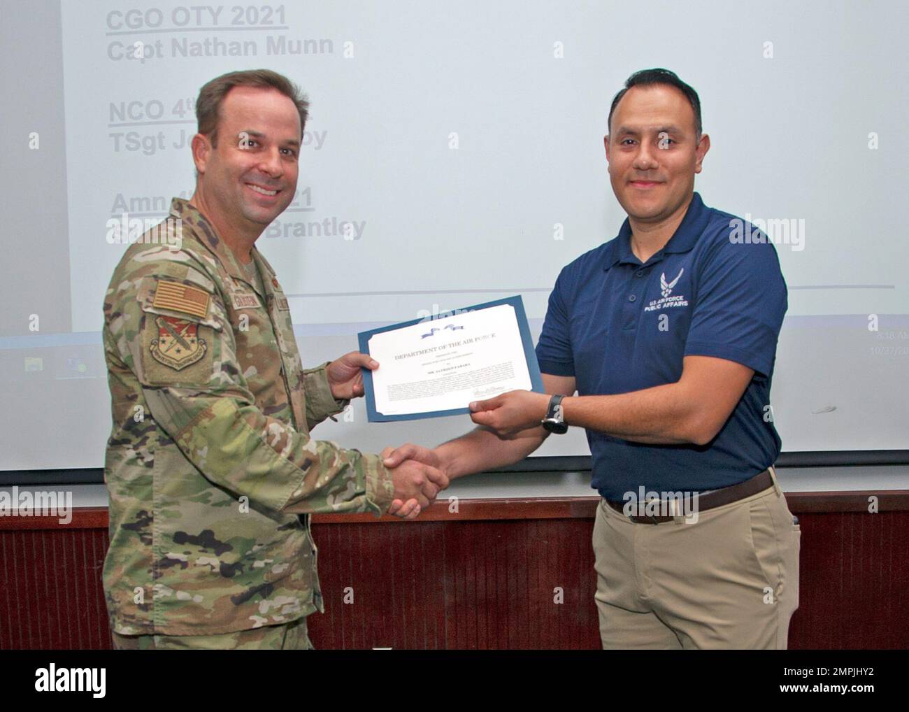 Col. Kyle Goldstein, 340th Flying Training Group commander, presents ...