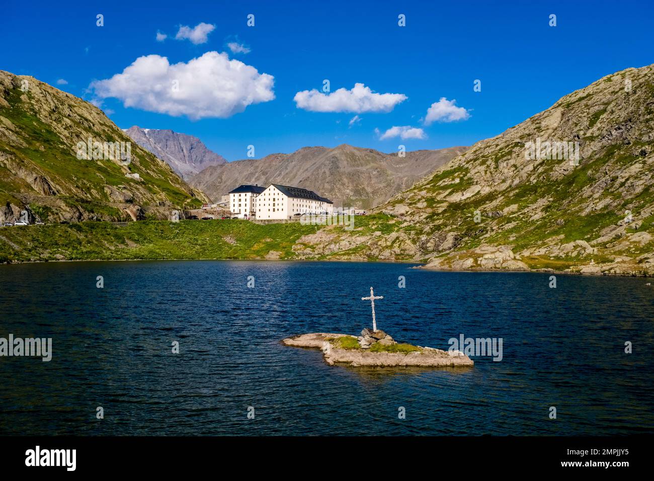 The lake Lac du Grant Saint-Bernard, buildings and alpine scenery on ...