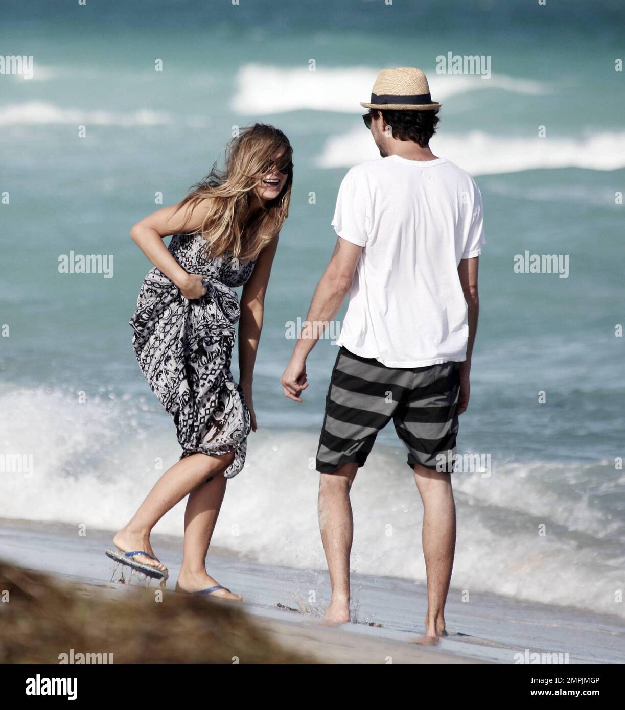 Carmen Electra looks windswept as she takes a stroll on Miami Beach in ...
