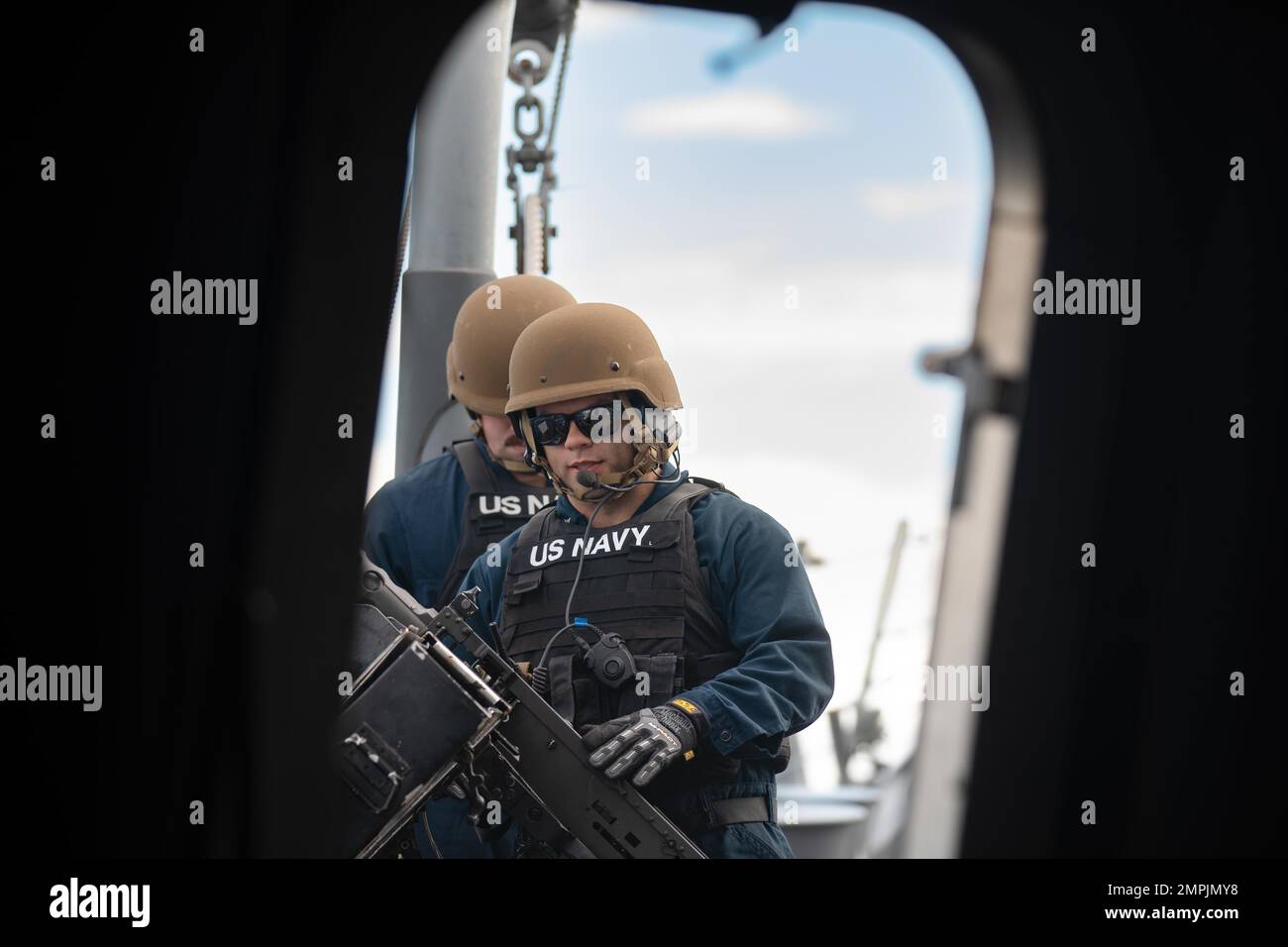 Gunner's Mate 1st Class Ryan Scott prepares a M2 .50-caliber heavy ...
