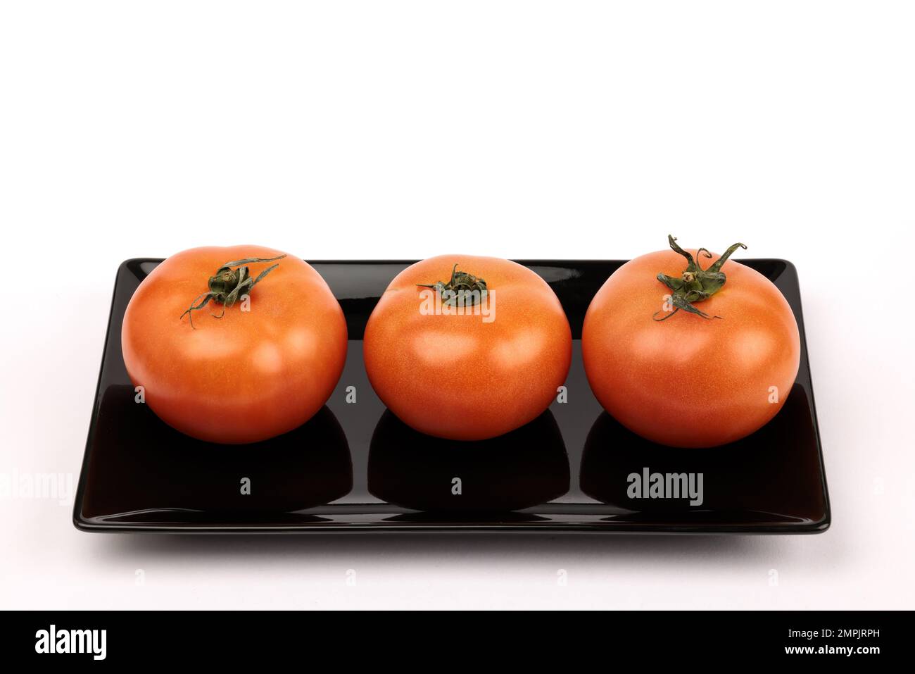 Plate tomatoes tomatos hi-res stock photography and images - Alamy