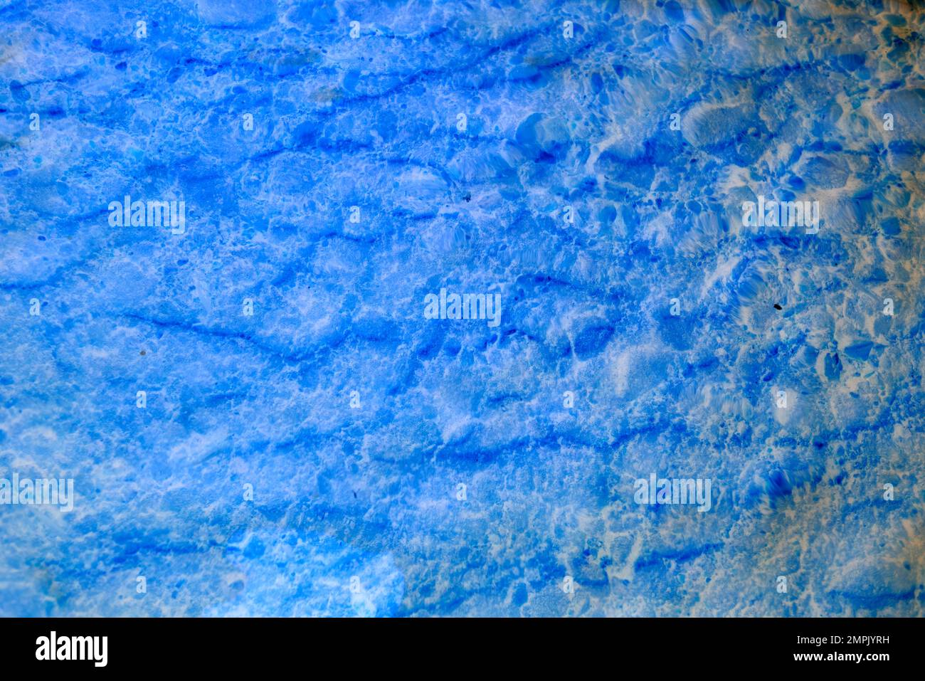 Abstract photo of neon blue glow of transparent clear water with waves ...