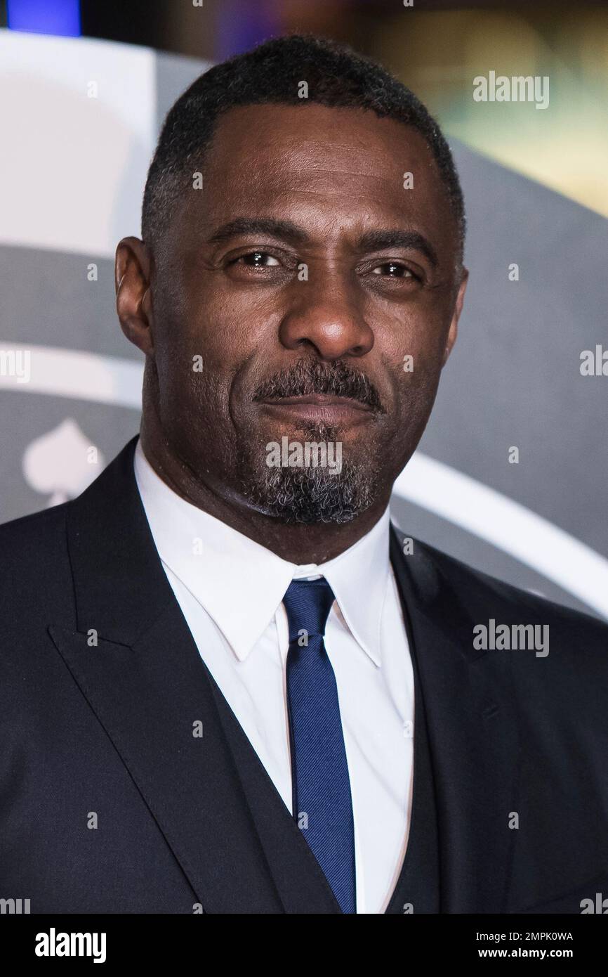 Actor Idris Elba poses for photographers upon arrival at the premiere ...