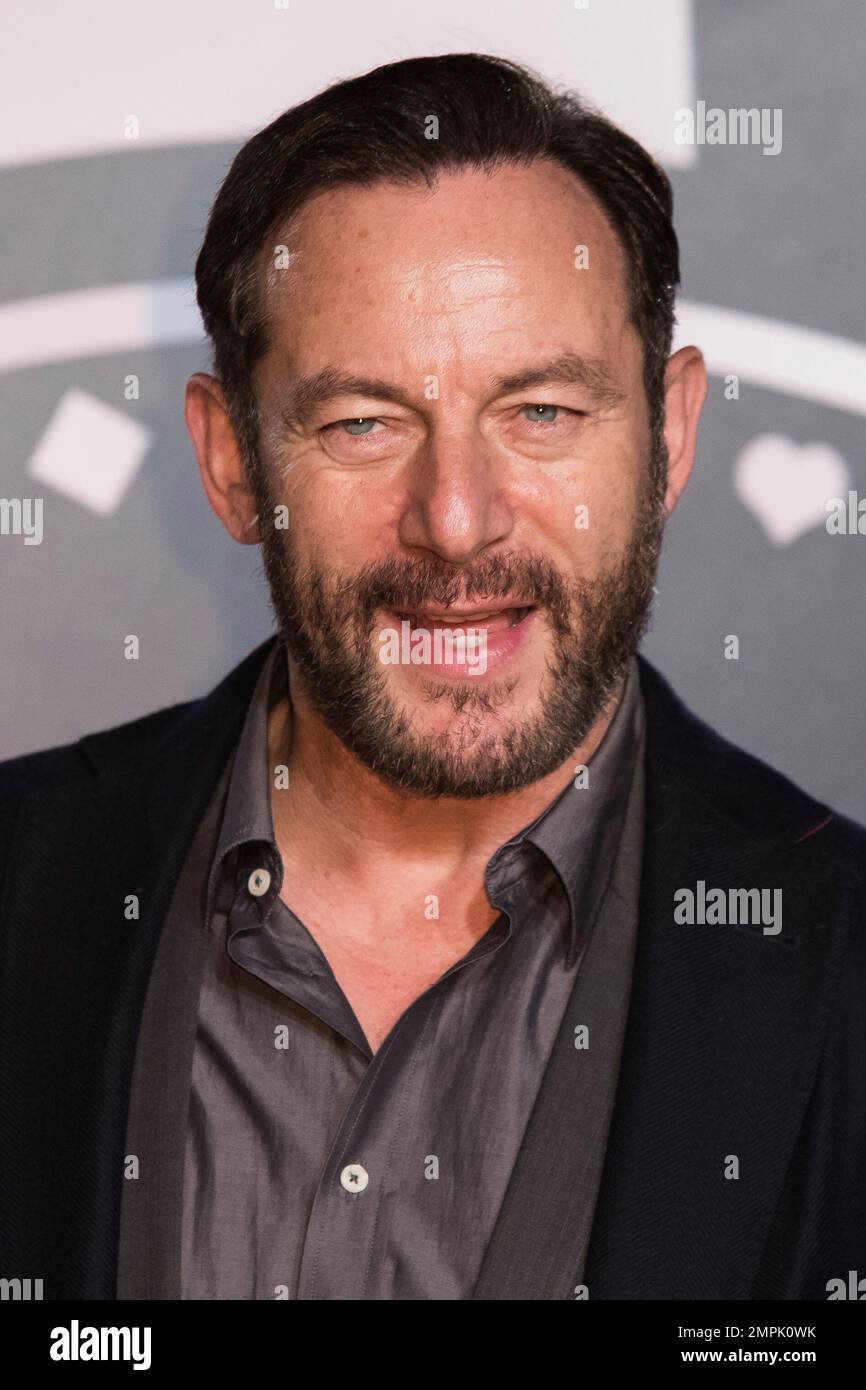 Actor Jason Isaacs poses for photographers upon arrival at the premiere ...