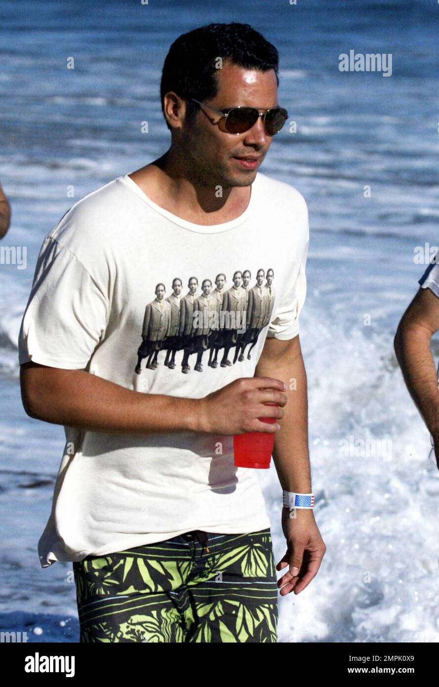Jessica Alba's husband Cash Warren strolls on the beach as he ...