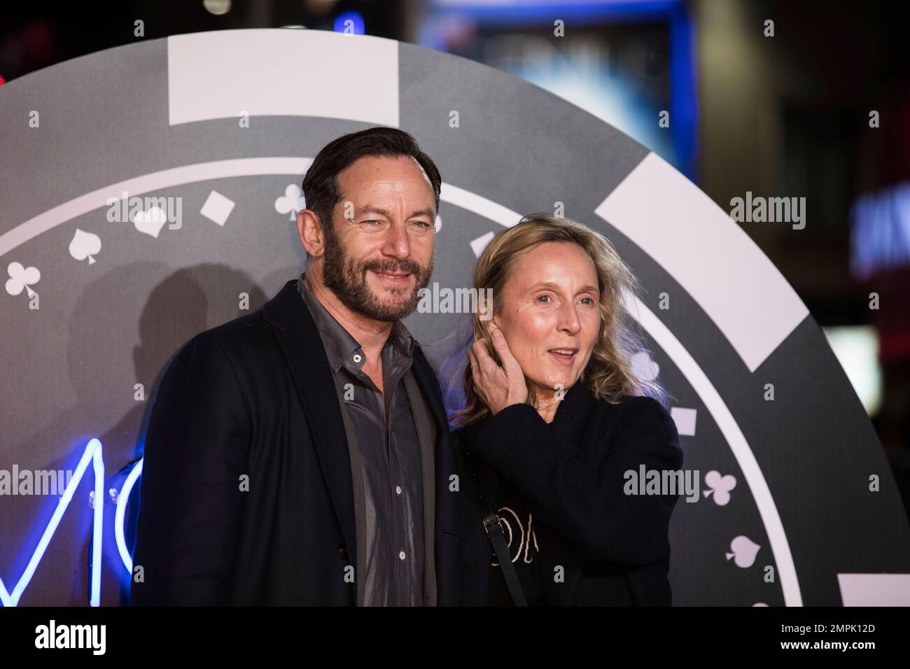 Actor Jason Isaacs and his wife pose for photographers upon arrival at ...