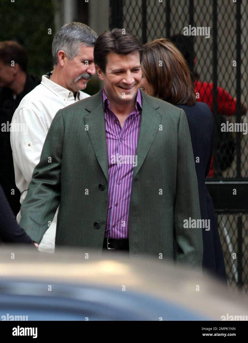 Nathan Fillion and Stana Katic film a scene on the set of "Castle" in ...