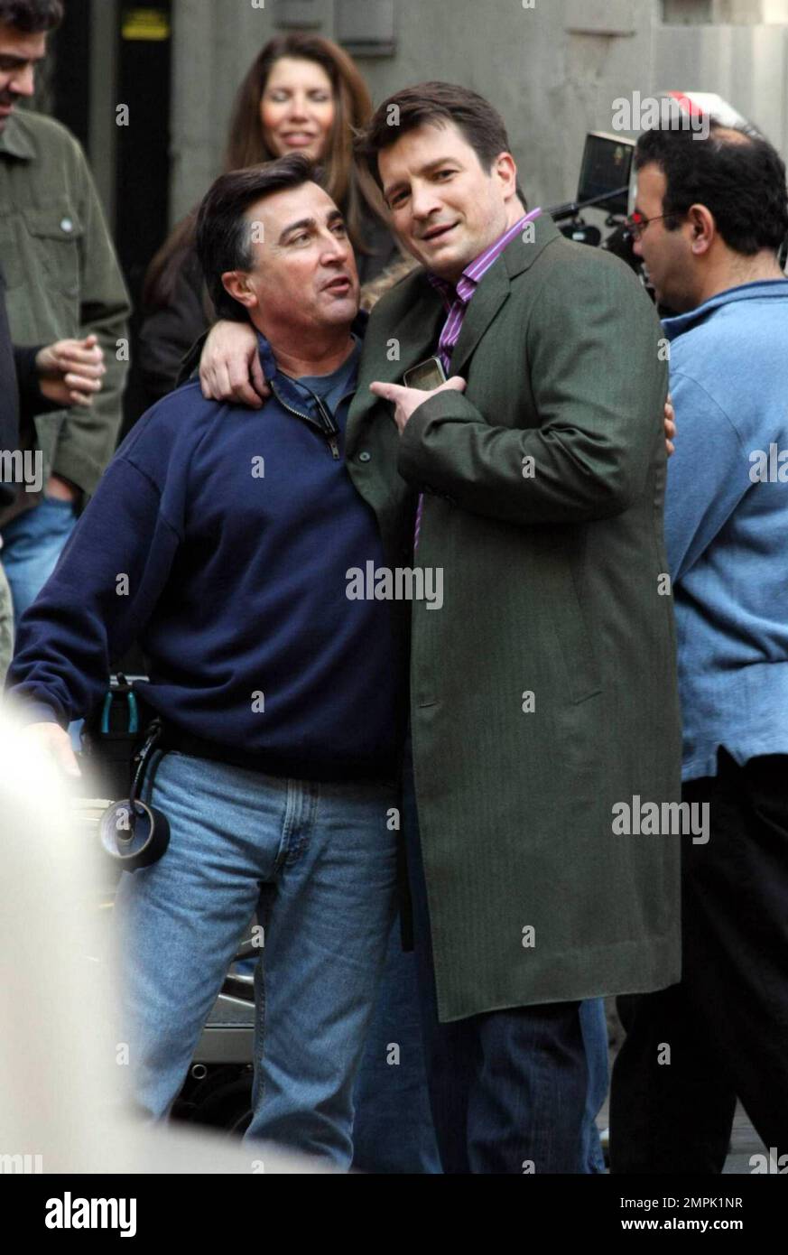 Nathan Fillion and Stana Katic film a scene on the set of "Castle" in ...