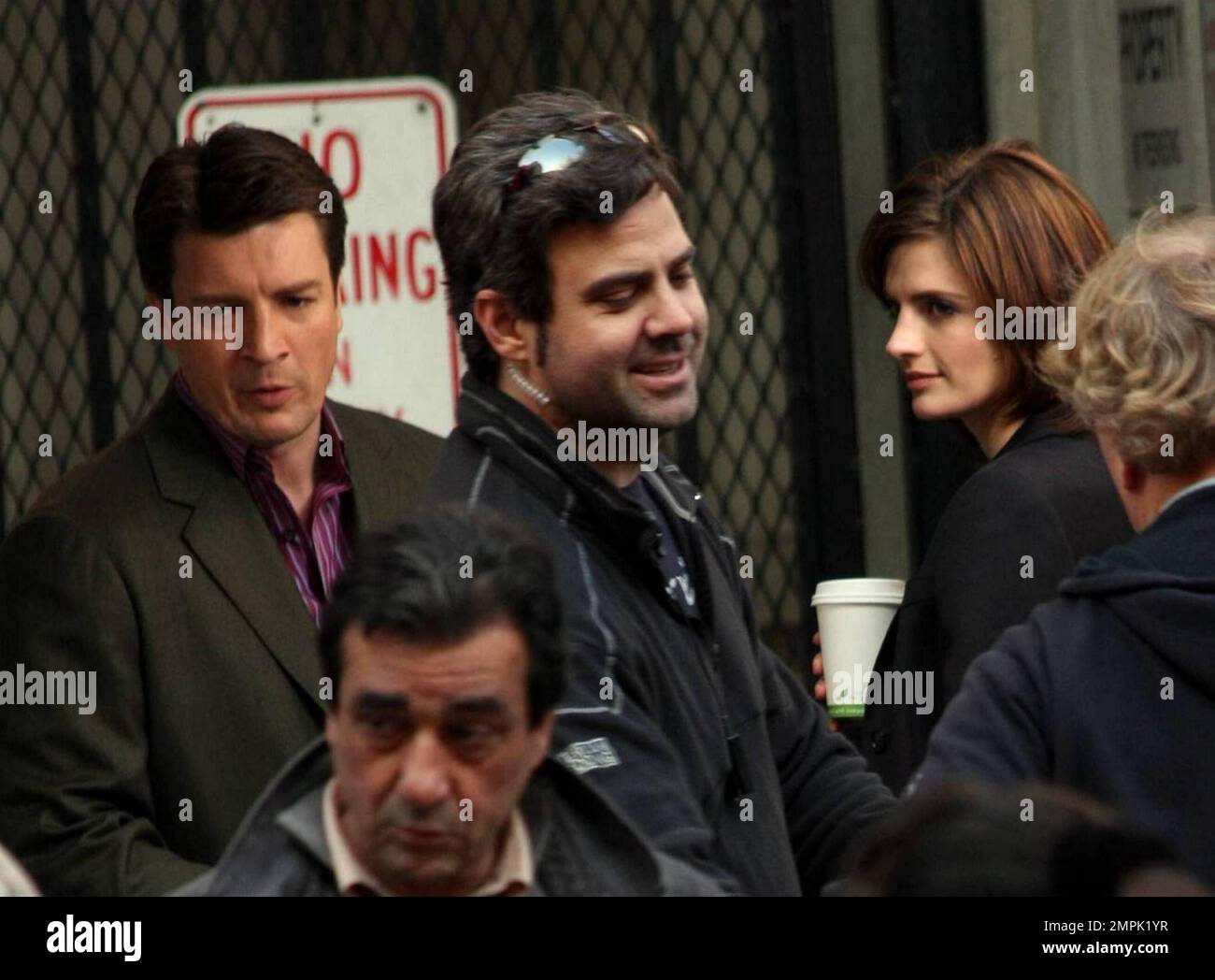 Nathan Fillion and Stana Katic film a scene on the set of "Castle" in ...