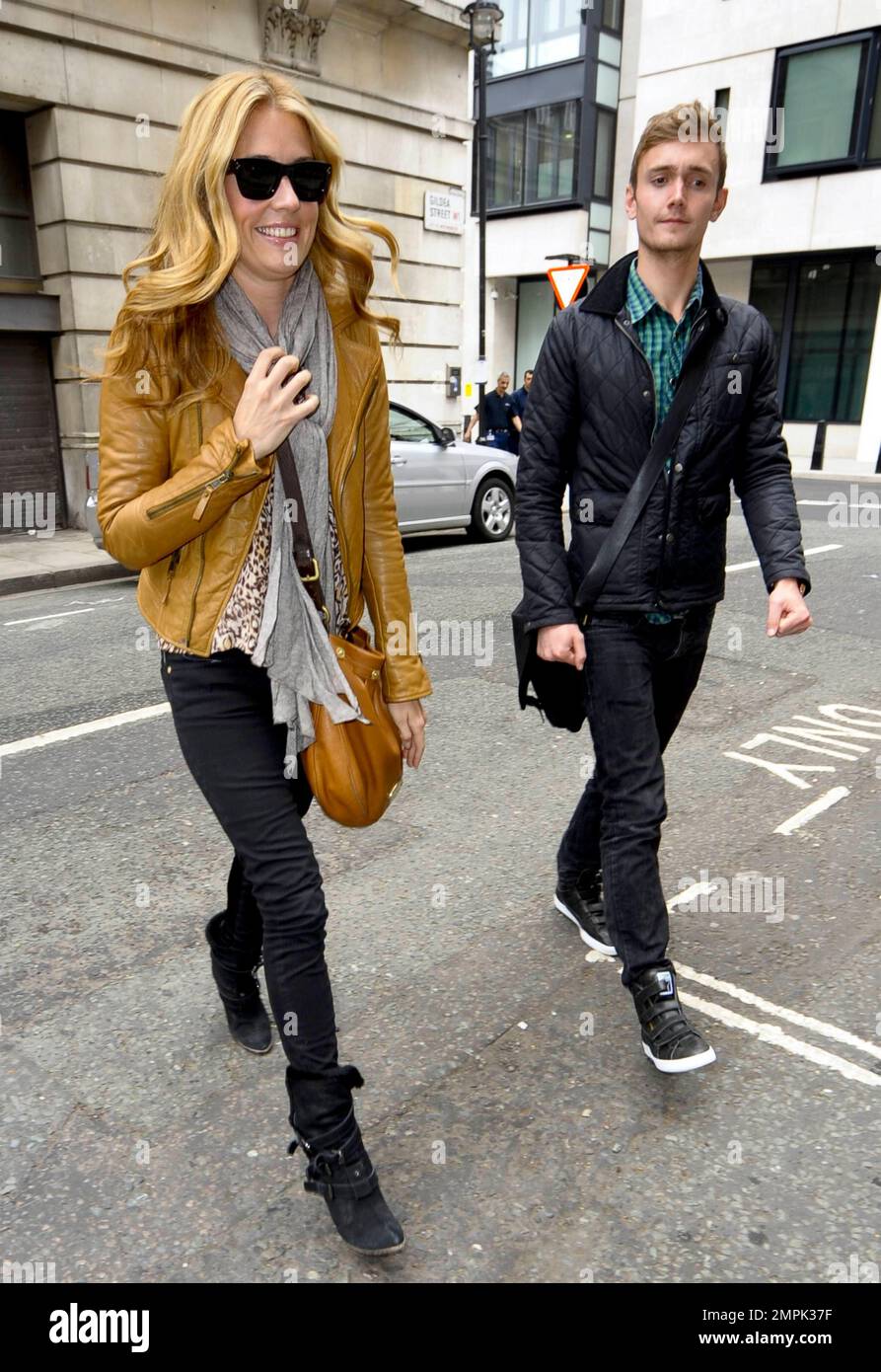 Television presenter Cat Deeley strolls with a friend in the west end ...