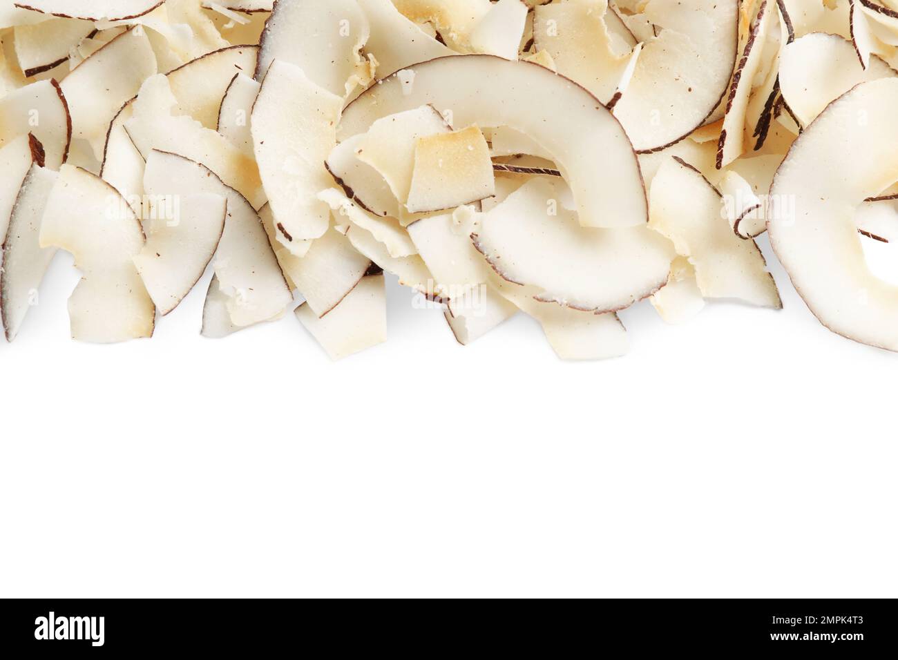 Pile of coconut chips isolated on white, top view Stock Photo - Alamy