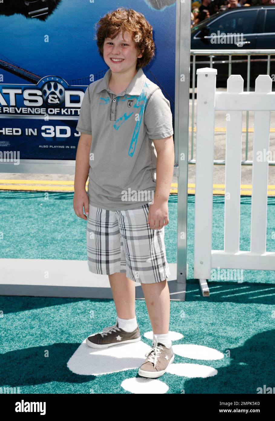 Nolan Gould walks the green carpet for the Los Angeles premiere of ...