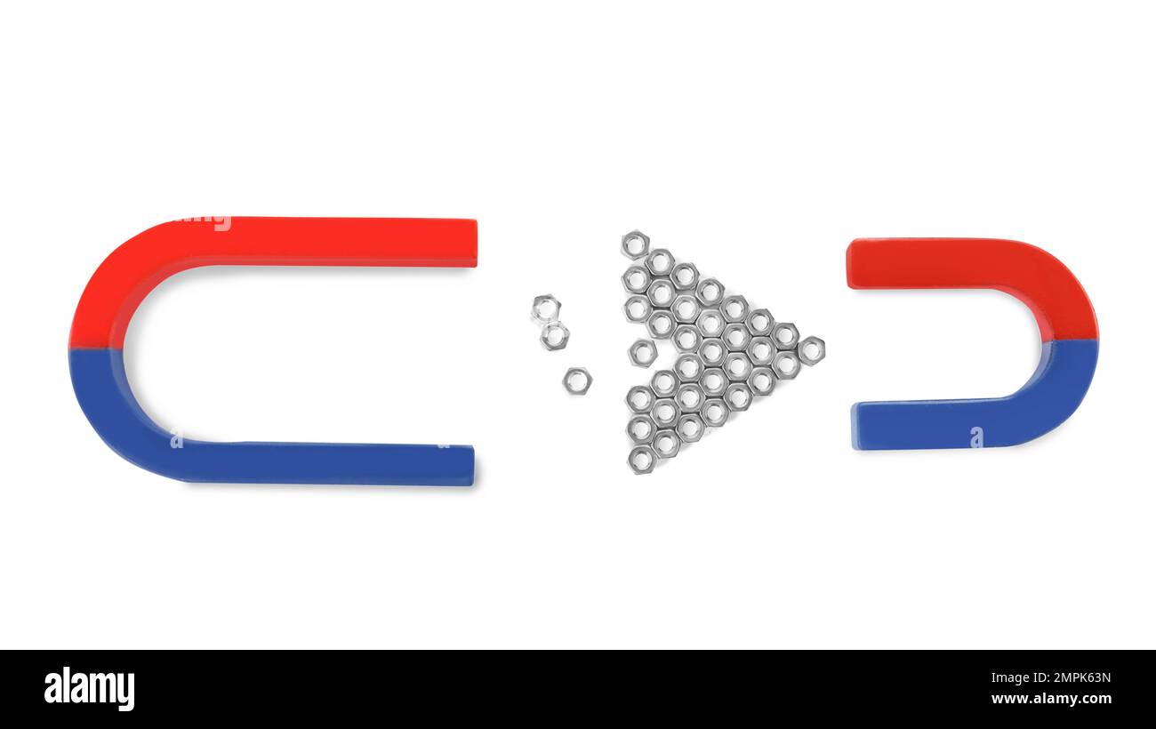 Magnets attracting metal nuts on white background, top view Stock Photo ...