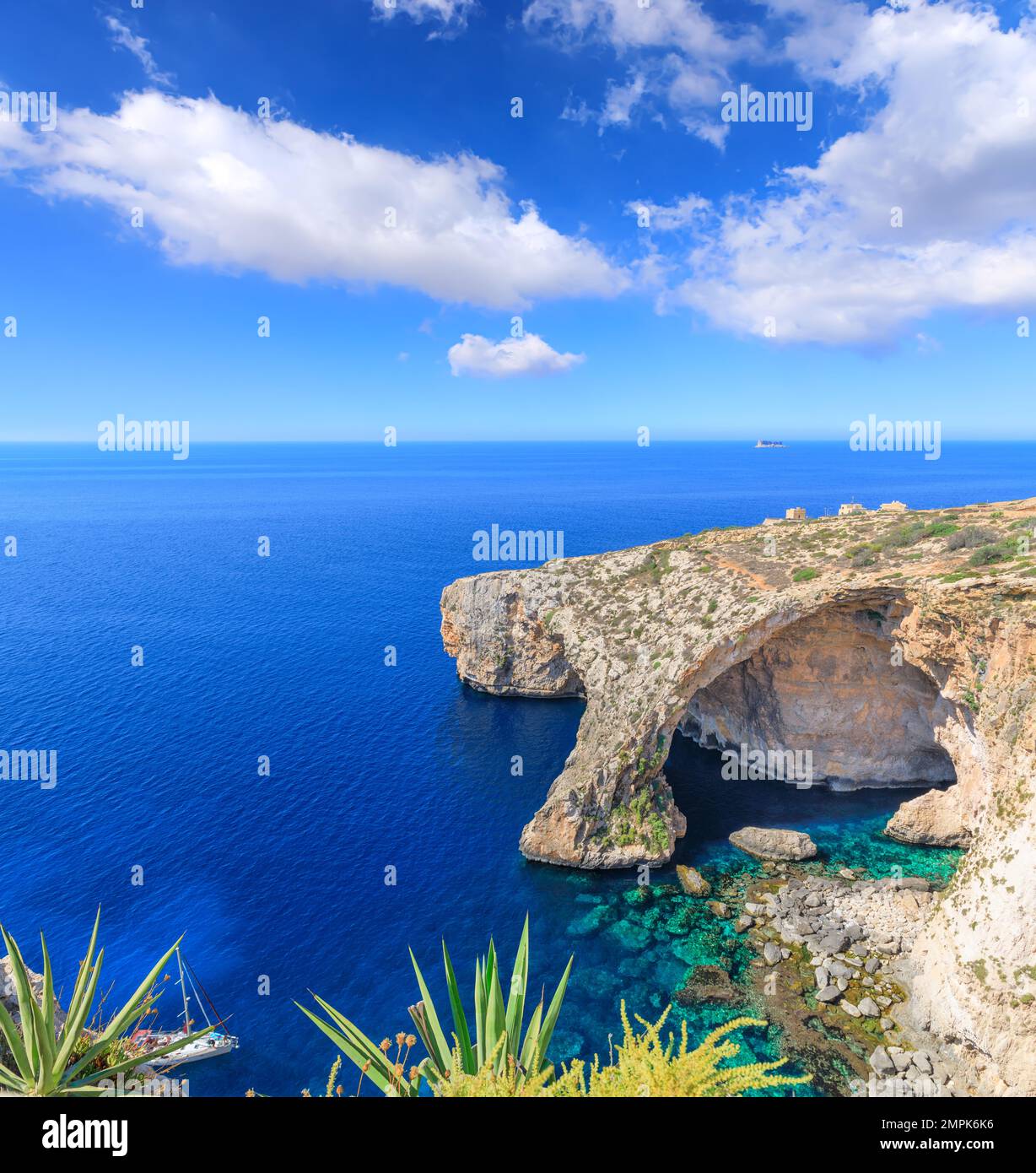 Blue Grotto in Malta. The sea cave is located near Wied iż-Żurrieq ...