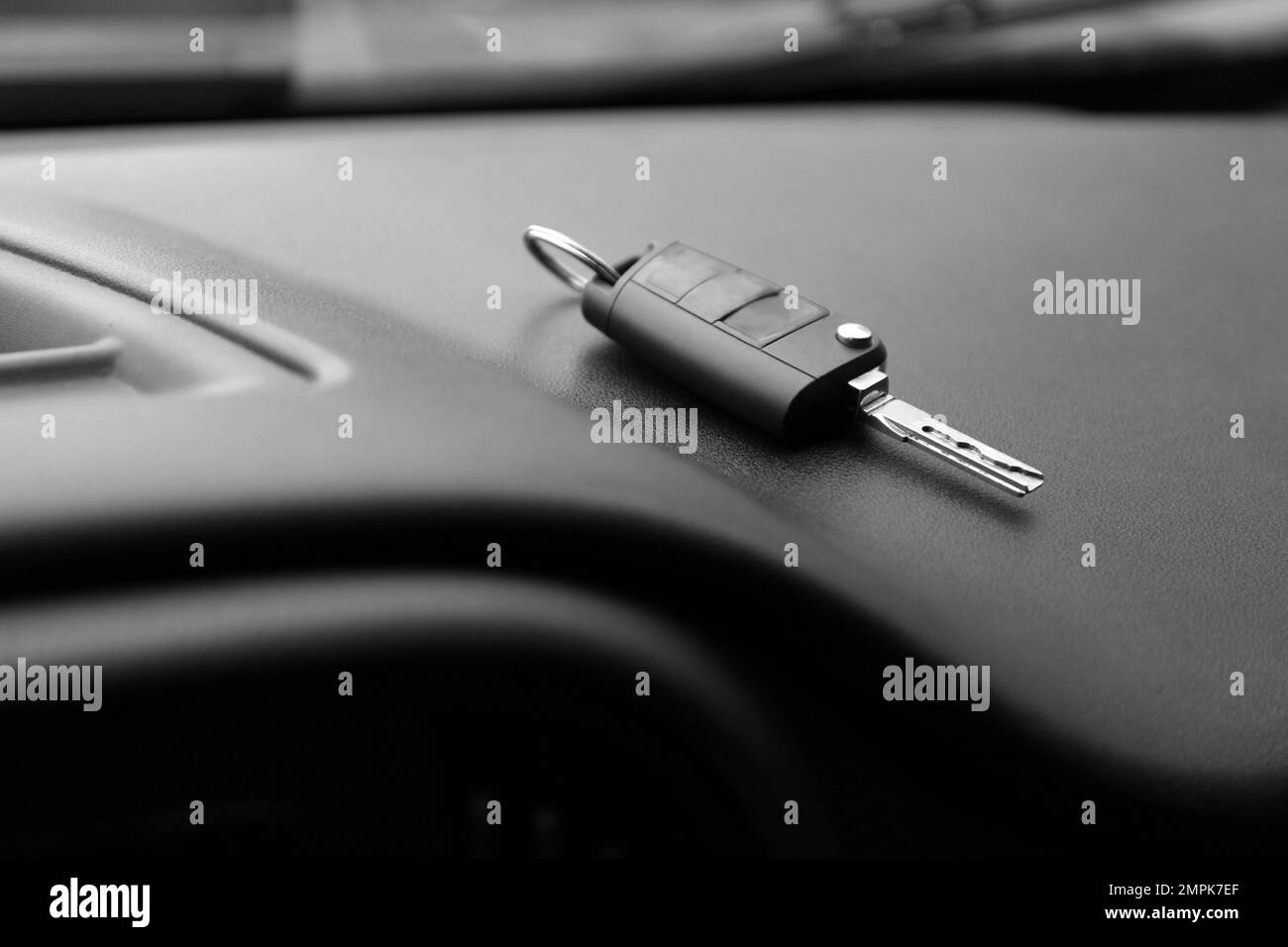 Key in new modern automobile. Car buying Stock Photo - Alamy