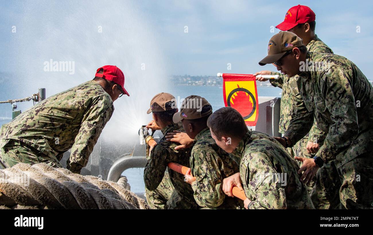 221031-N-AV223-1008 SAN DIEGO (Oct. 31, 2022) Sailors conduct a damage ...