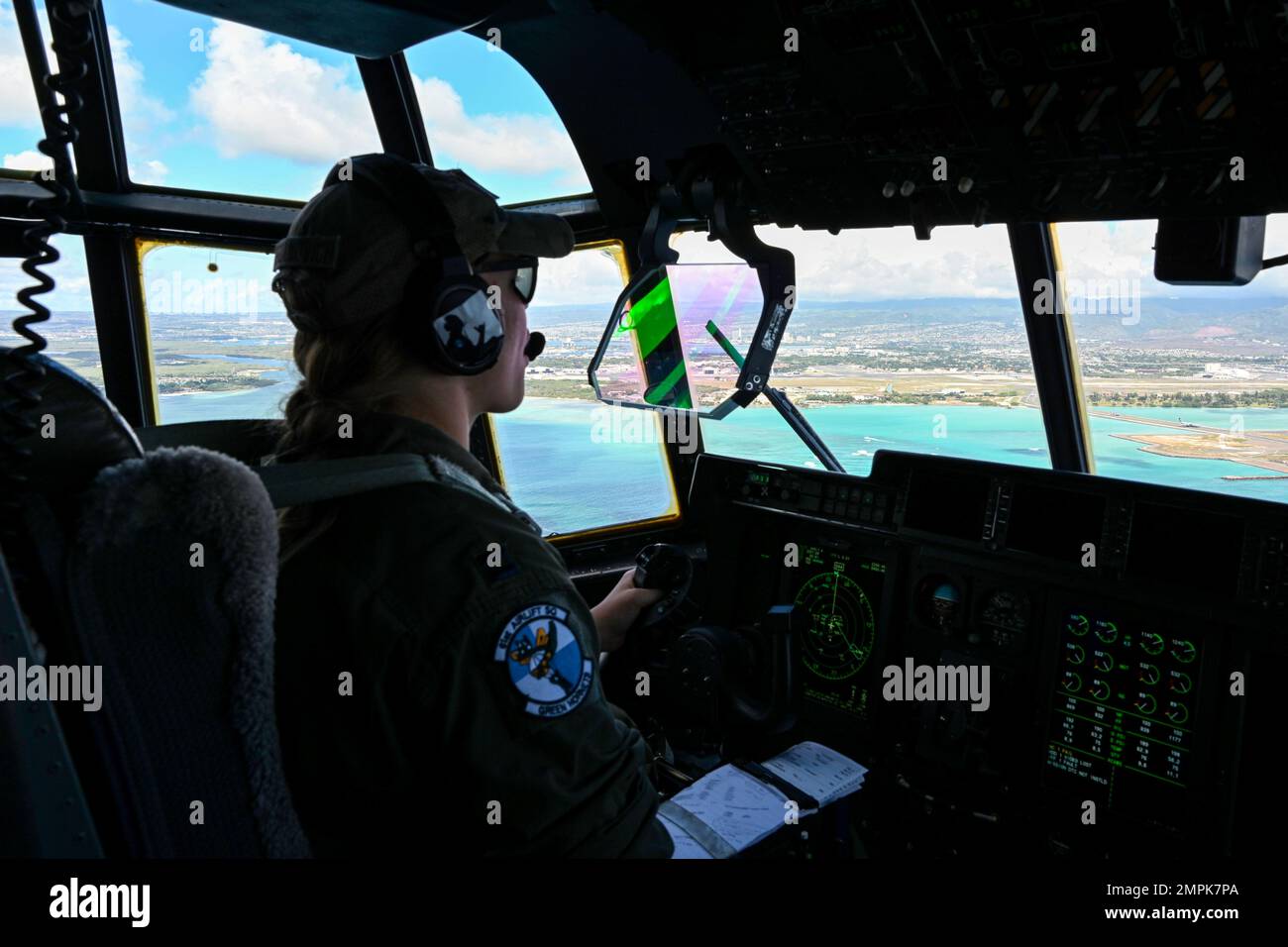 Capt. Riley Germanovich, 61st Airlift Squadron pilot, prepares to land ...