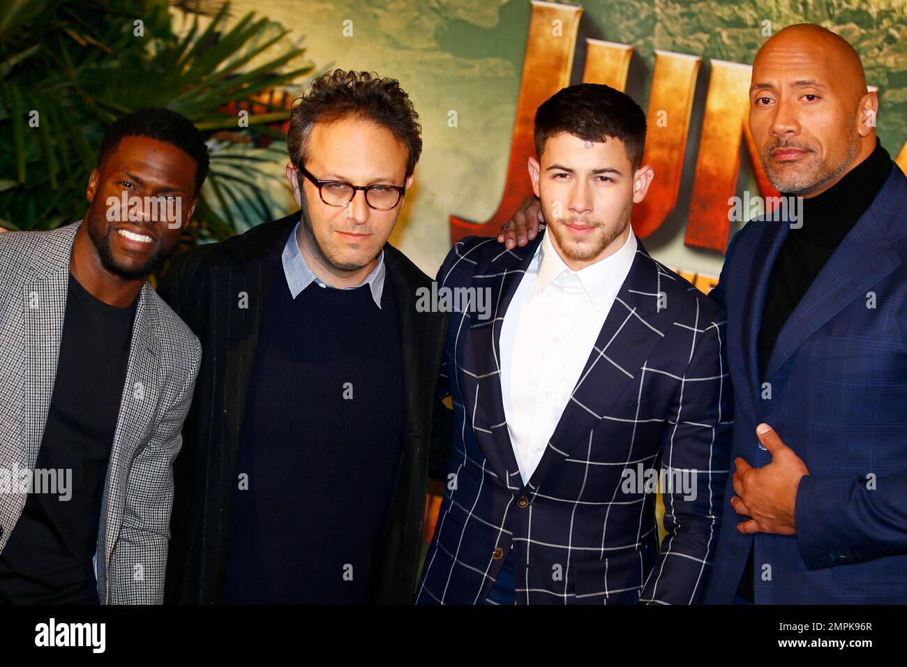 US Director Jake Kasdan, second left, poses with U.S. actors, Kevin ...