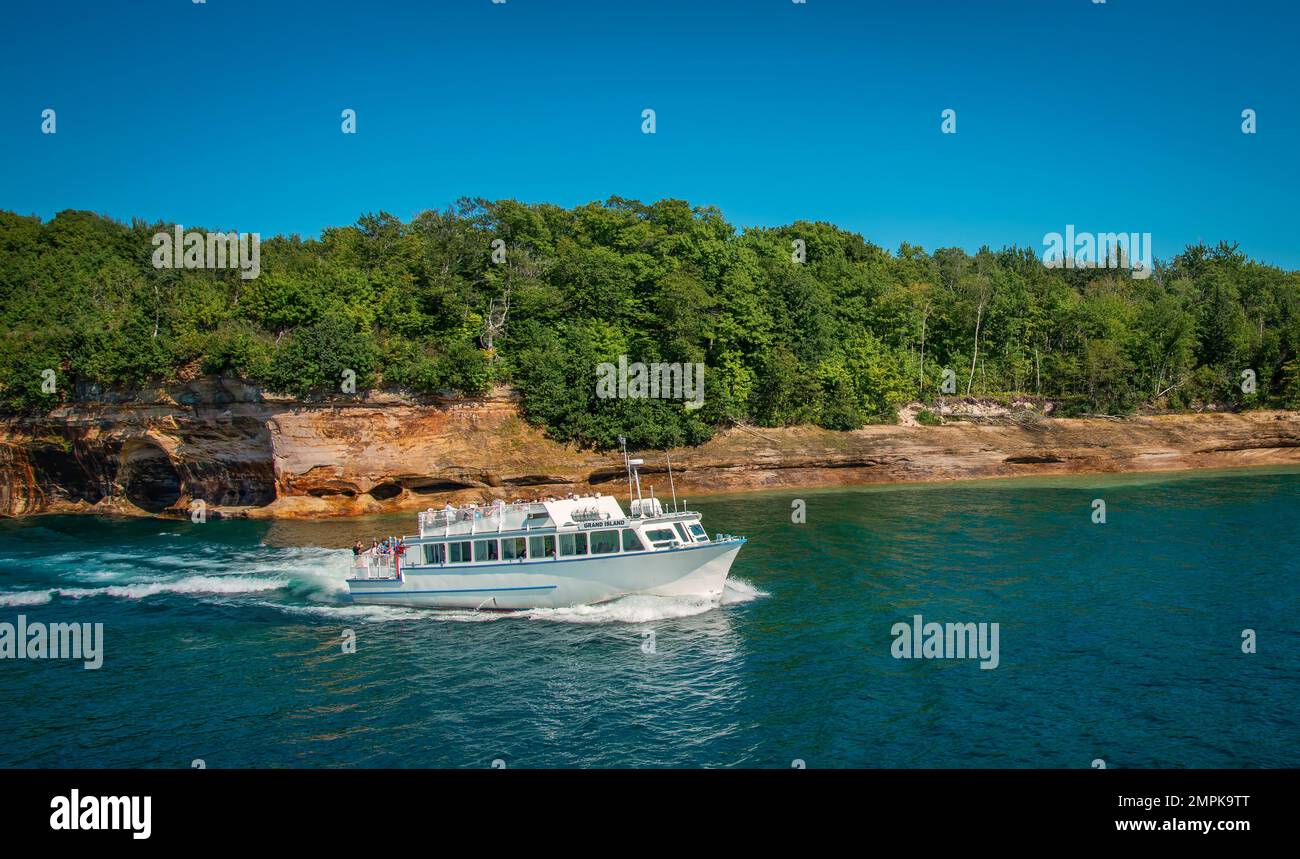 Visiting passengers on tour of pictured rock lake shore Lake Superior ...
