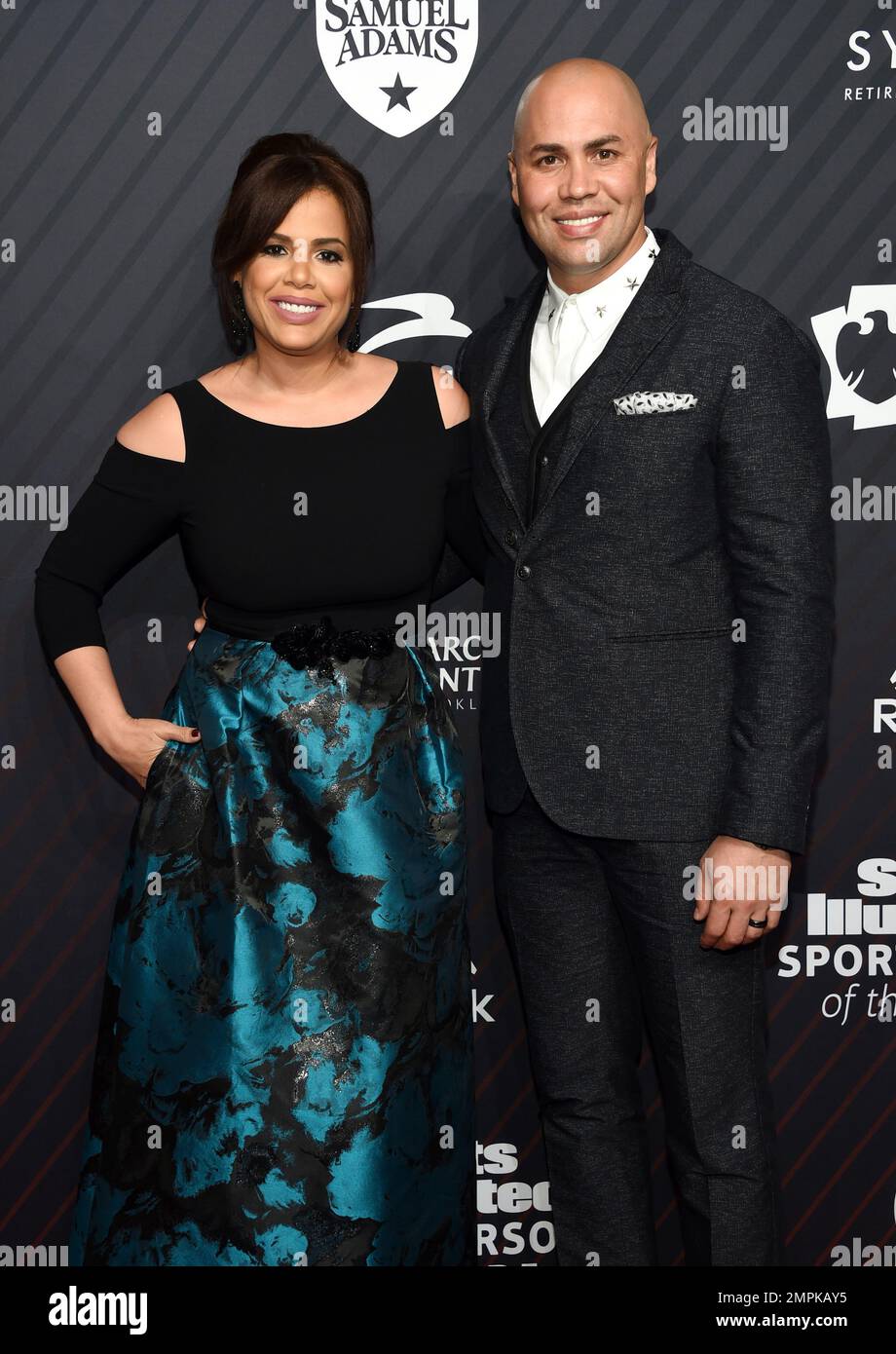 Professional baseball player Carlos Beltran and wife Jessica Lugo ...