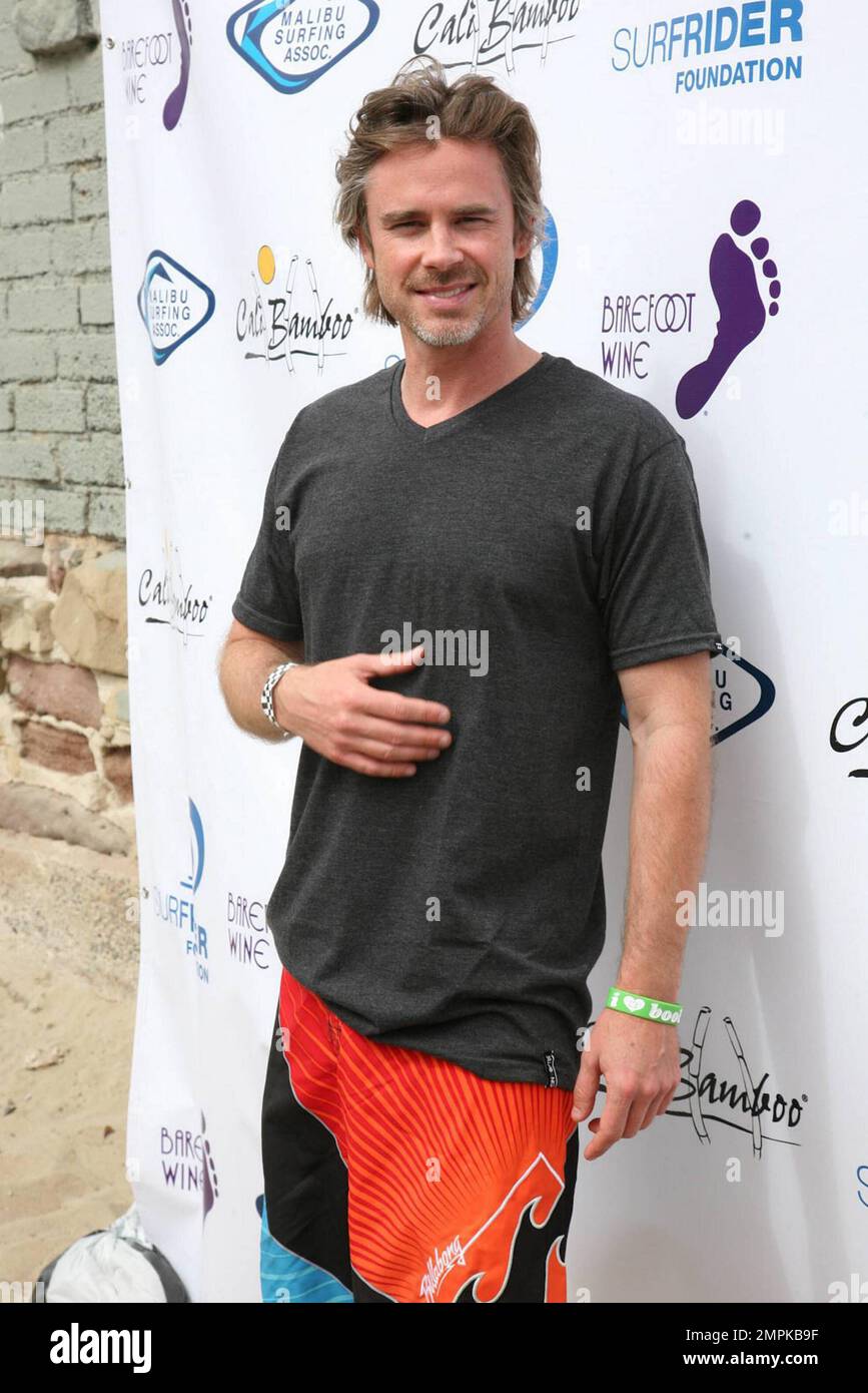 Sam Trammell poses in the sand during the 5th Annual Surfrider ...