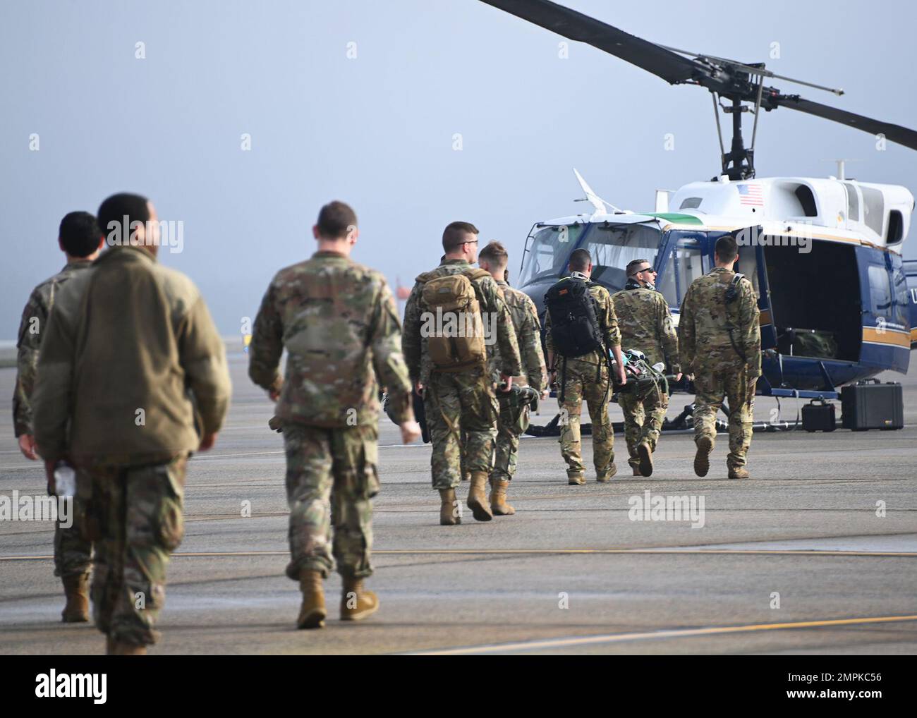 Members of the 316th Wing Critical Care Air Transport Teams walk ...