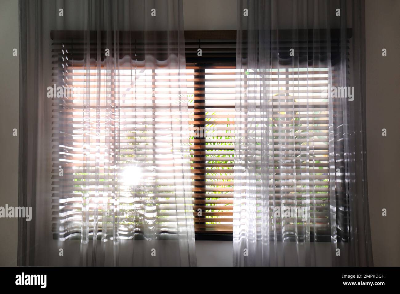 Window with beautiful curtains and blinds, closeup Stock Photo - Alamy