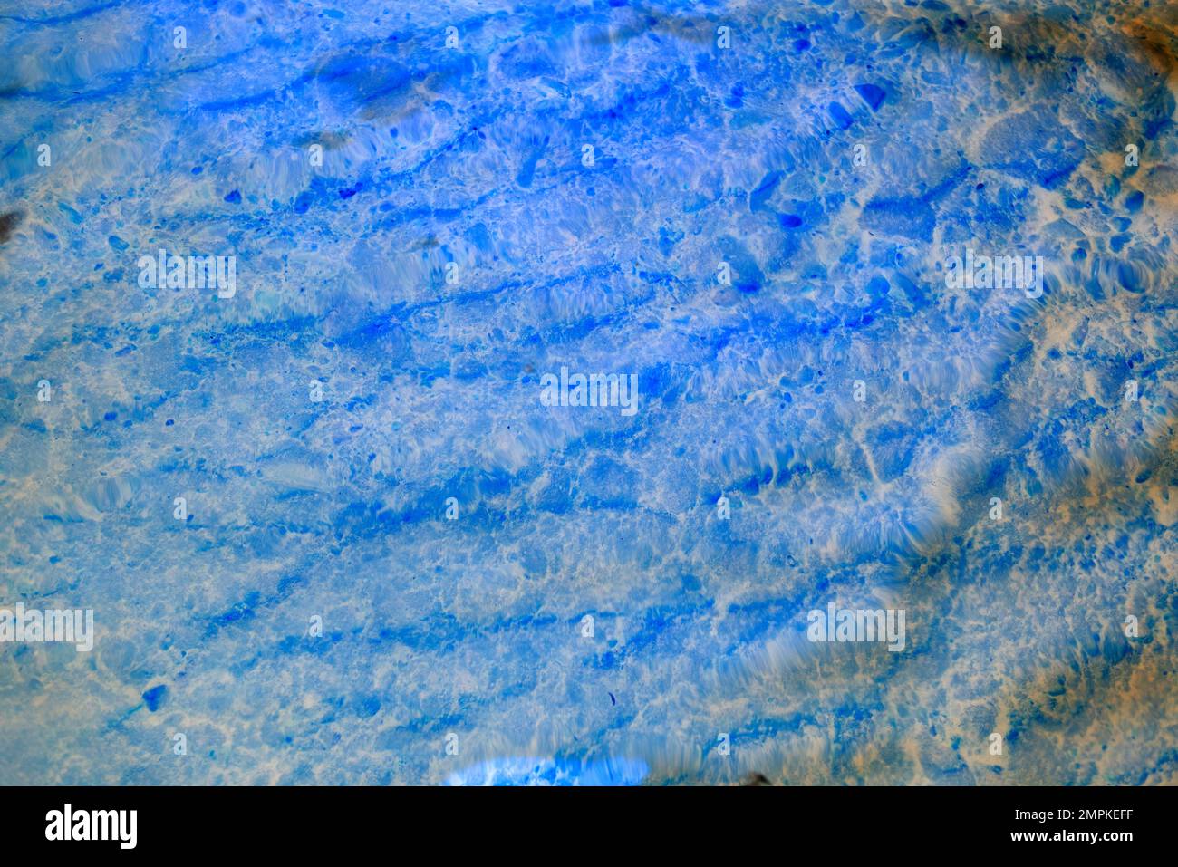 Abstract photo of glow in neon blue color of clear water texture with ...