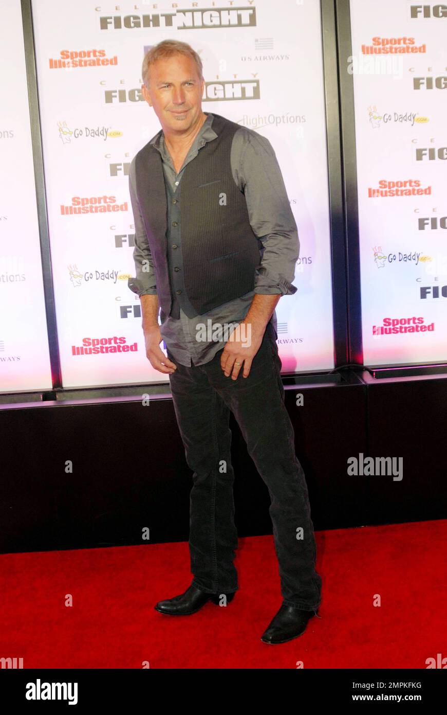 Kevin Costner poses for photographers on the red carpet at Muhammad Ali ...